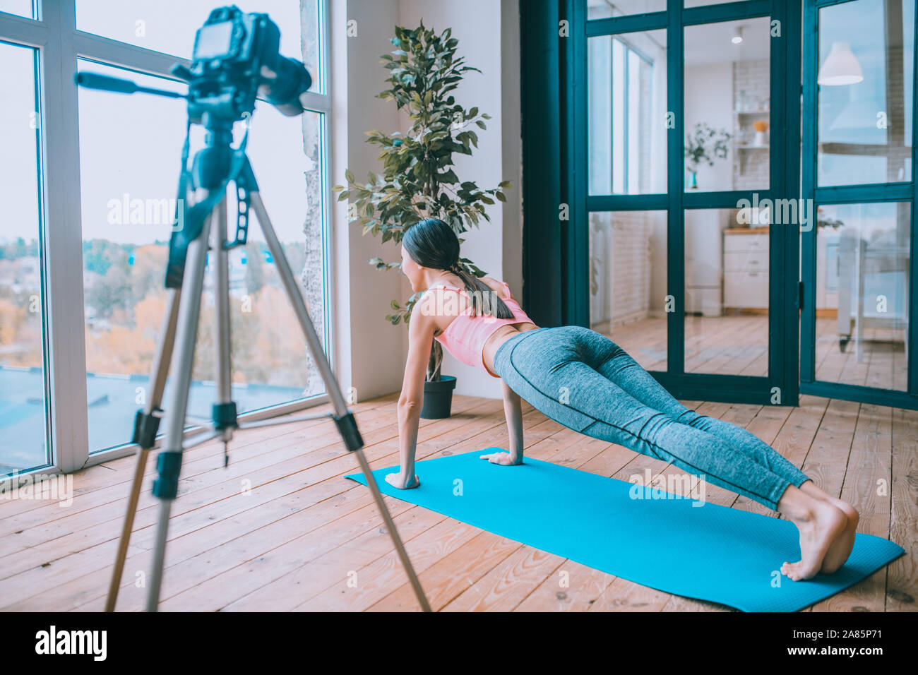 Beautiful woman making exercises hi-res stock photography and images ...