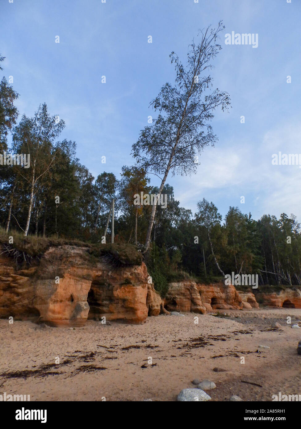 landscape with sandstone cliffs on the seashore, beautiful reflections ...
