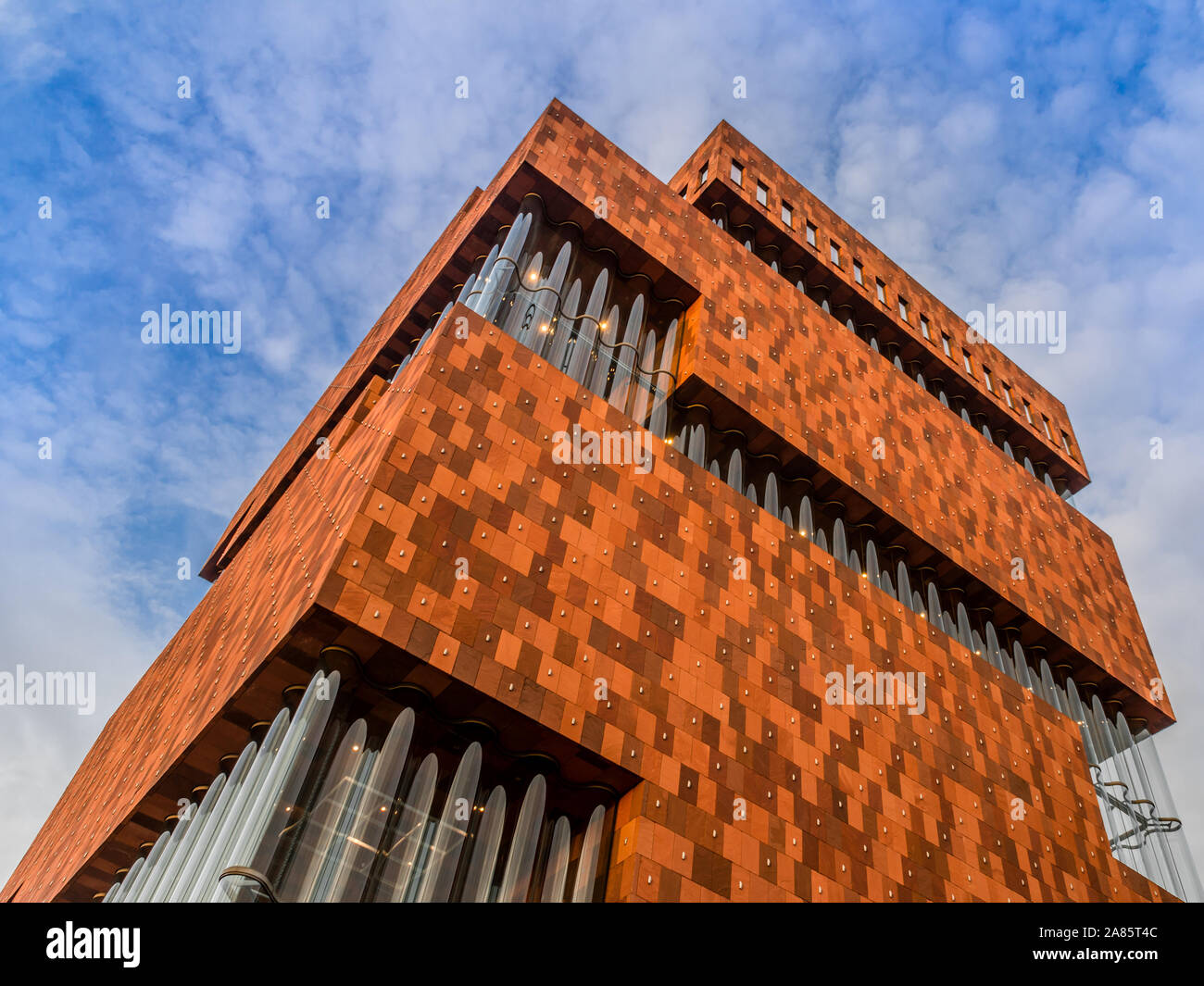 Exterior of MAS (Museum Aan de Stroom) tower clad in red Indian ...