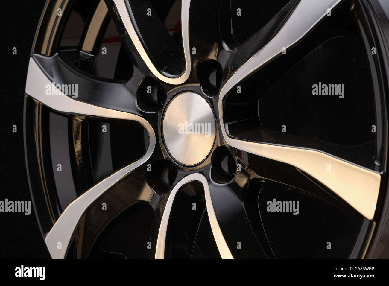 car alloy wheel close-up of the disc element, curves smooth lines of ...