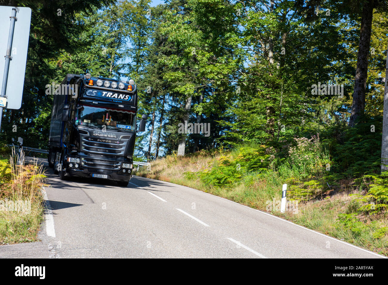 Lorry driving through forest hi-res stock photography and images - Alamy