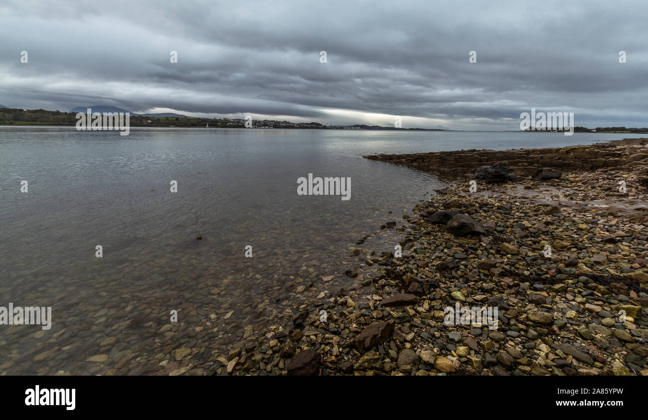 Autumn view across the Menai Strait, from Brynsiencyn on the Isle of ...