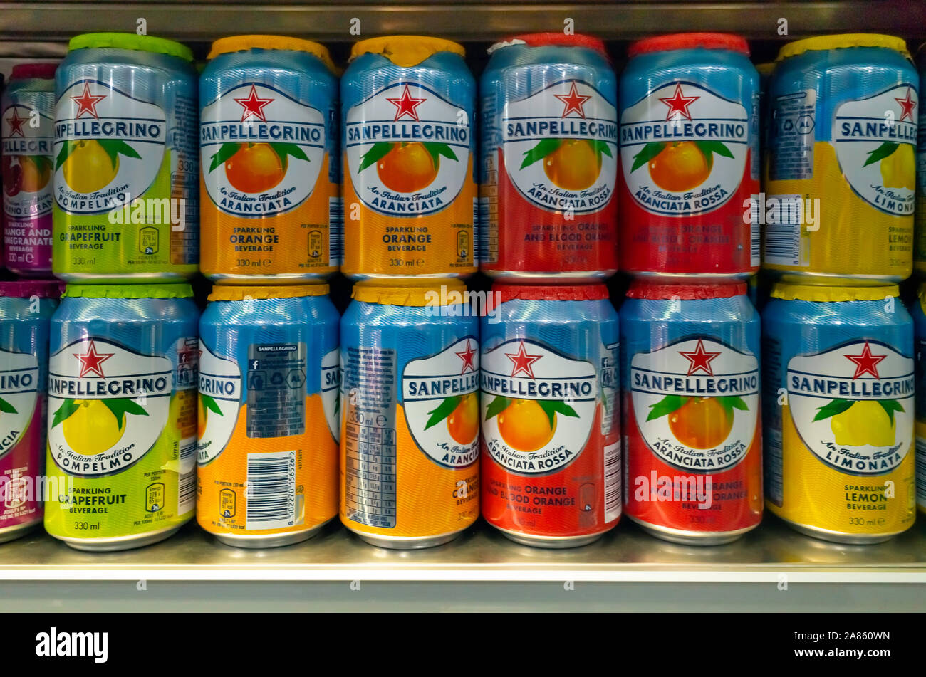 San Pellegrino Italian soft drink cans displayed on a shelf in a ...