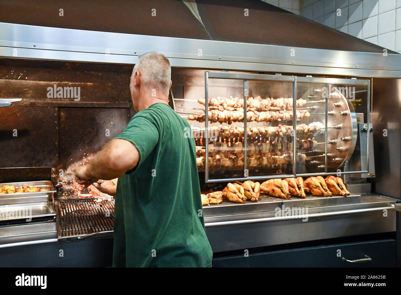 Buying roast chicken hi-res stock photography and images - Alamy