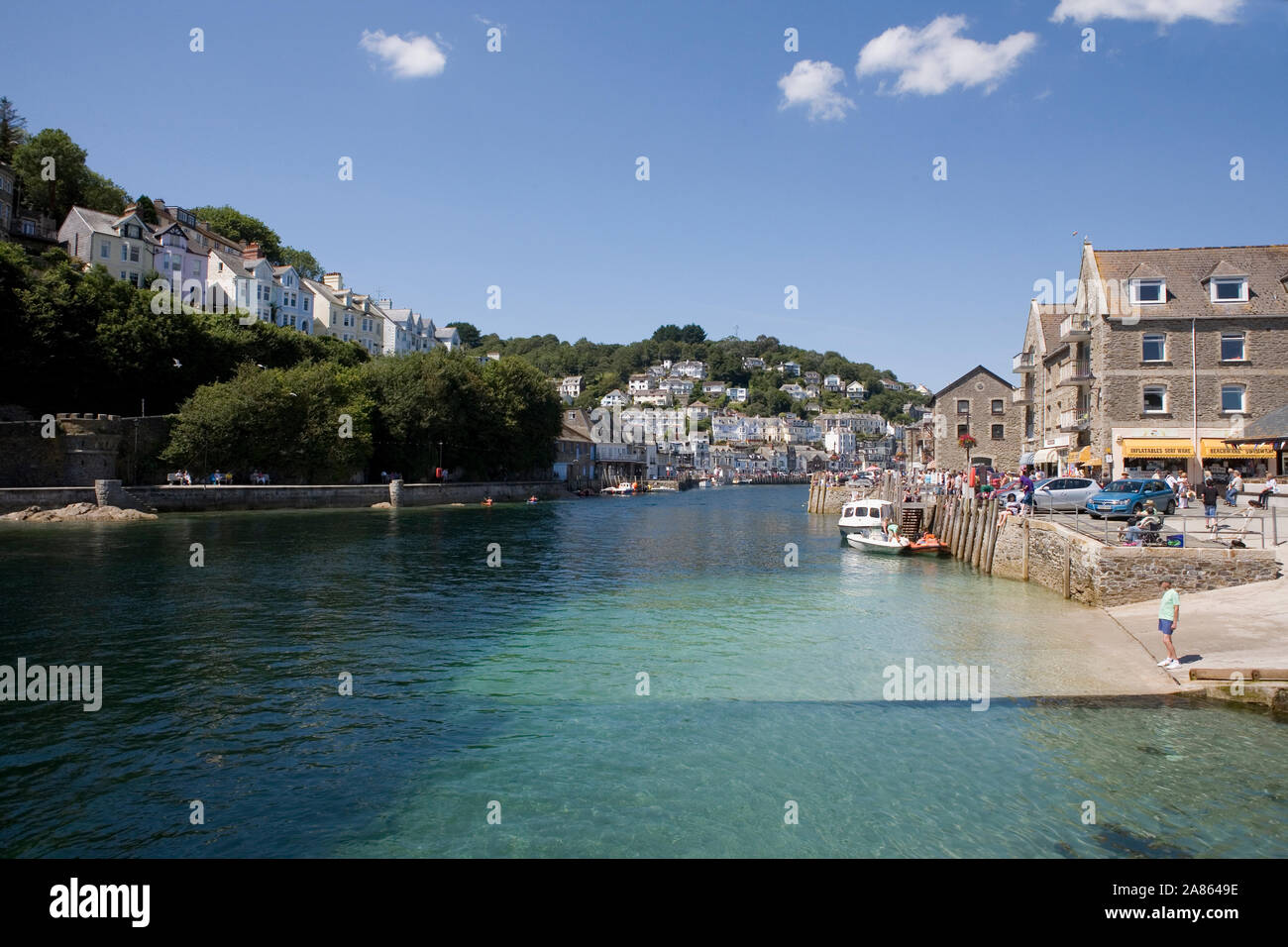 The harbour from the pier: Looe, Cornwall, UK on a bright Summer's day ...