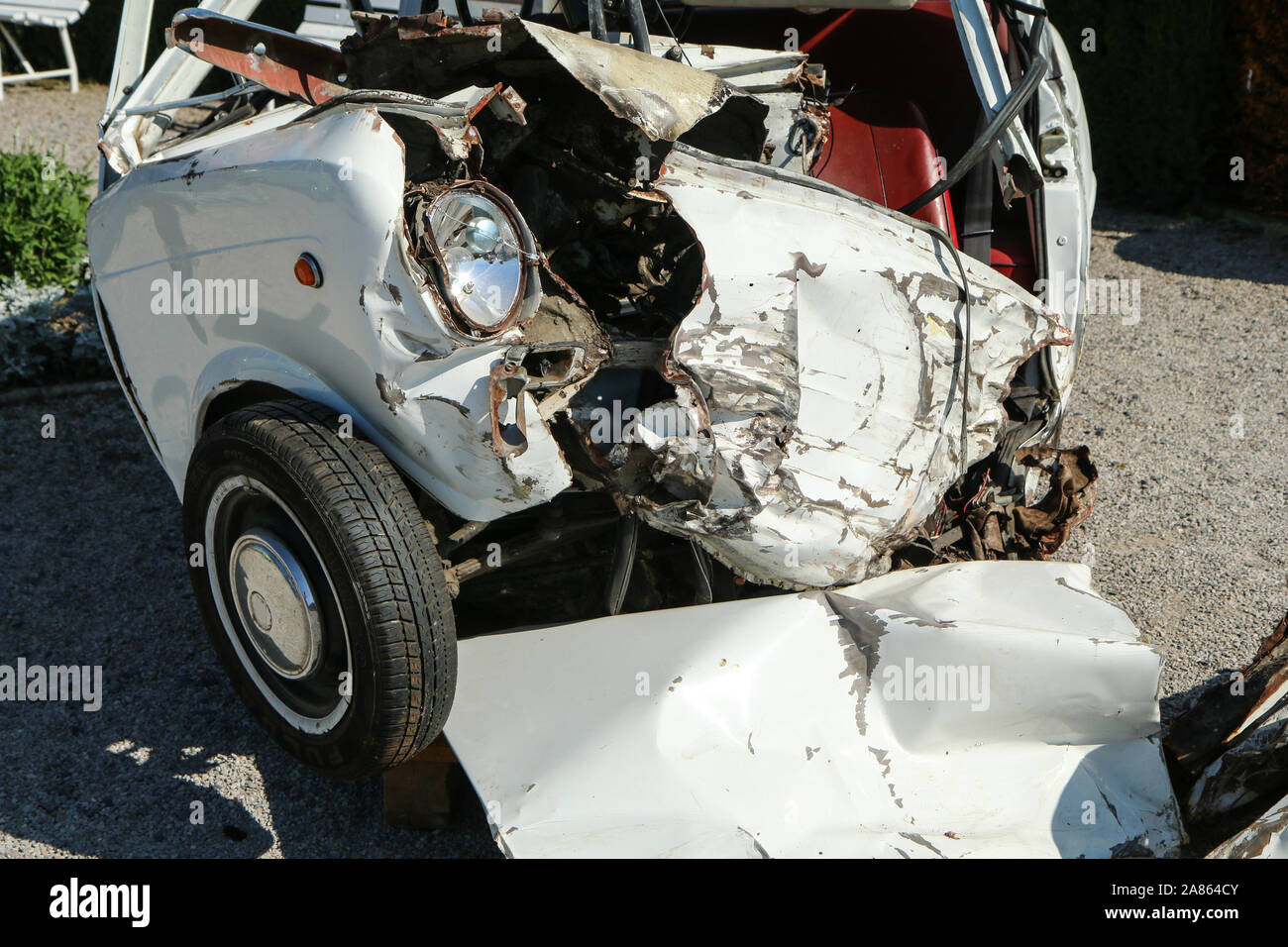 The detail of an old veteran small car after the collision with a ...