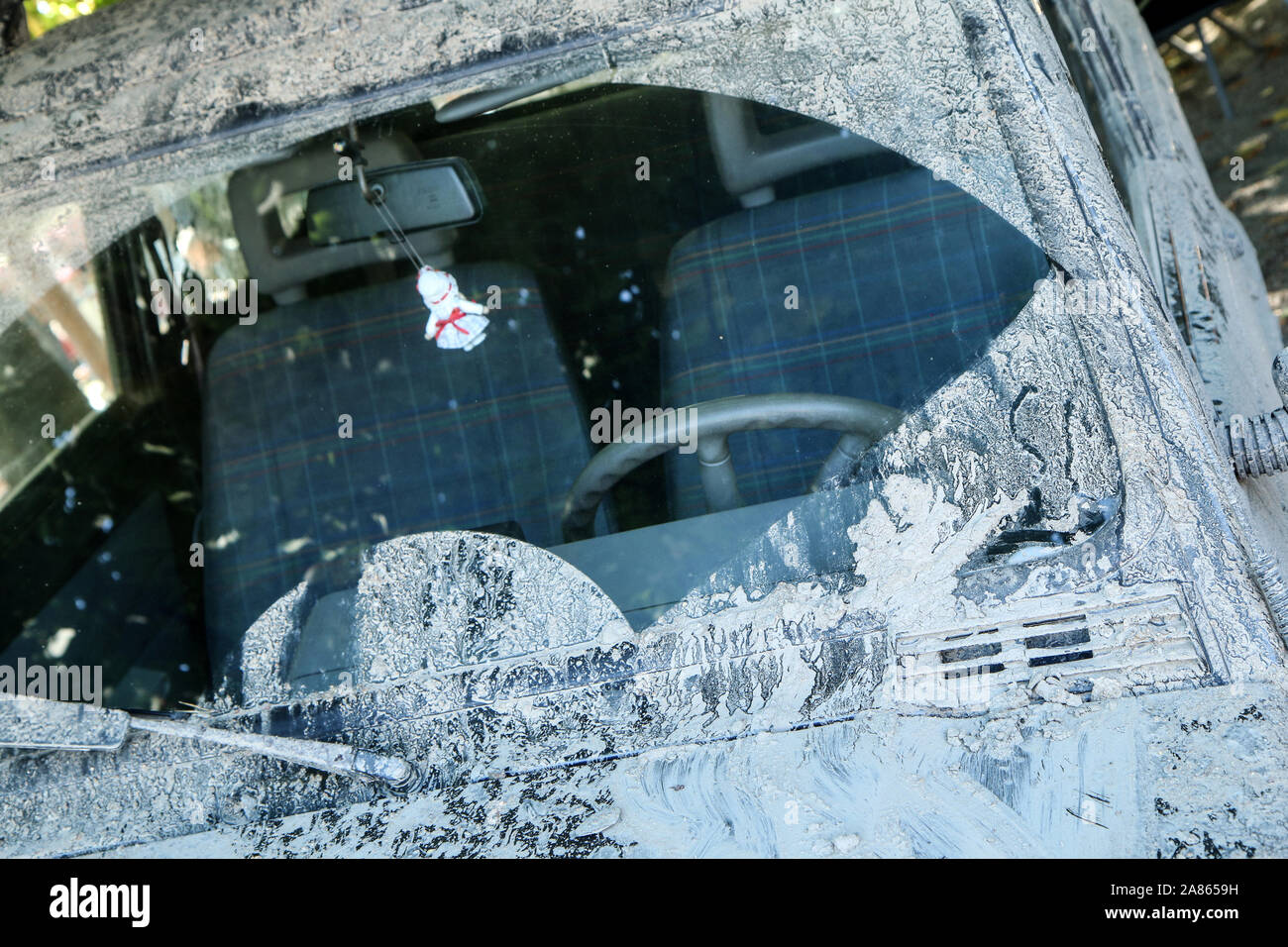 The detail of a car dirty from mud after the offroad race. It needs to ...