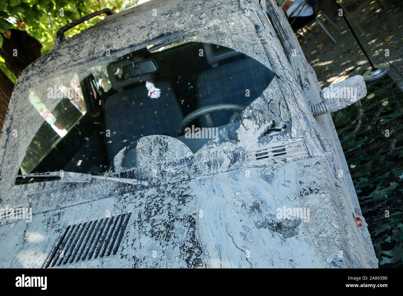 The detail of a car dirty from mud after the offroad race. It needs to ...