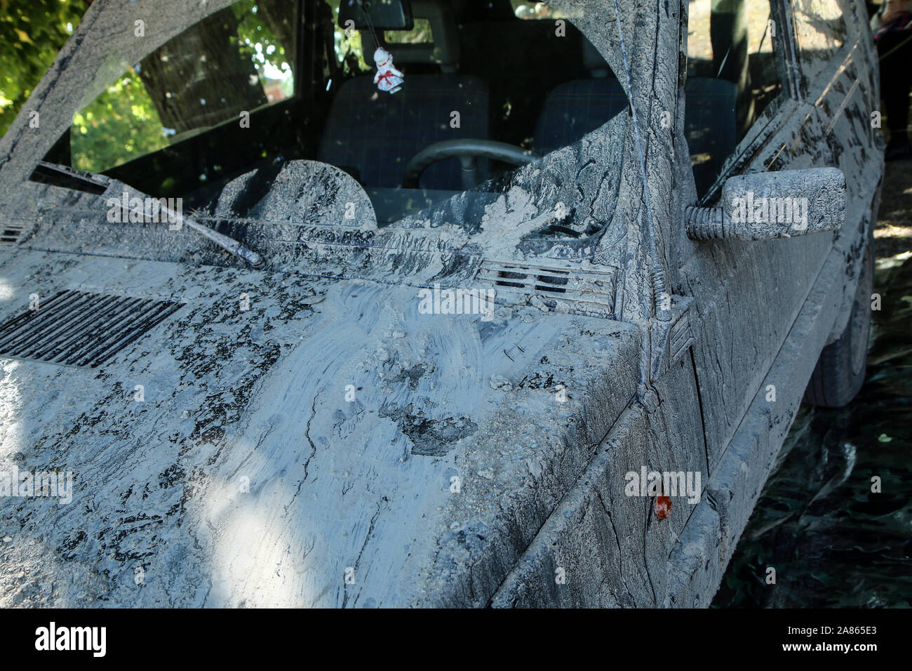 The detail of a car dirty from mud after the offroad race. It needs to ...