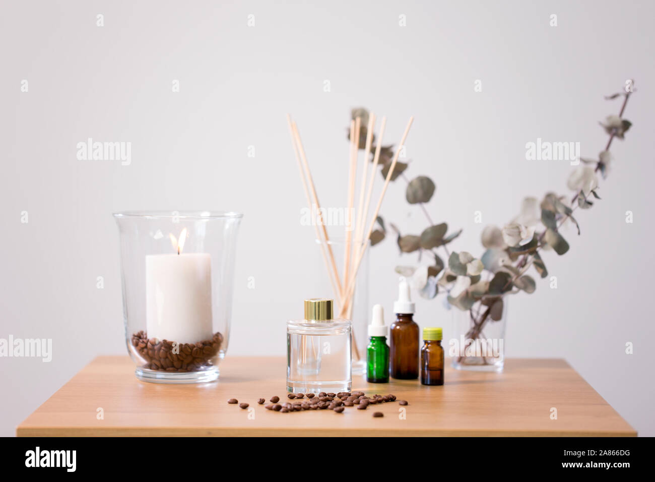 aroma reed diffuser, candle and essential oil Stock Photo - Alamy