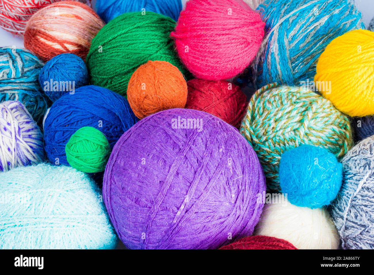 wool yarn ball. Colorful threads for needlework. Colorful fabric ...
