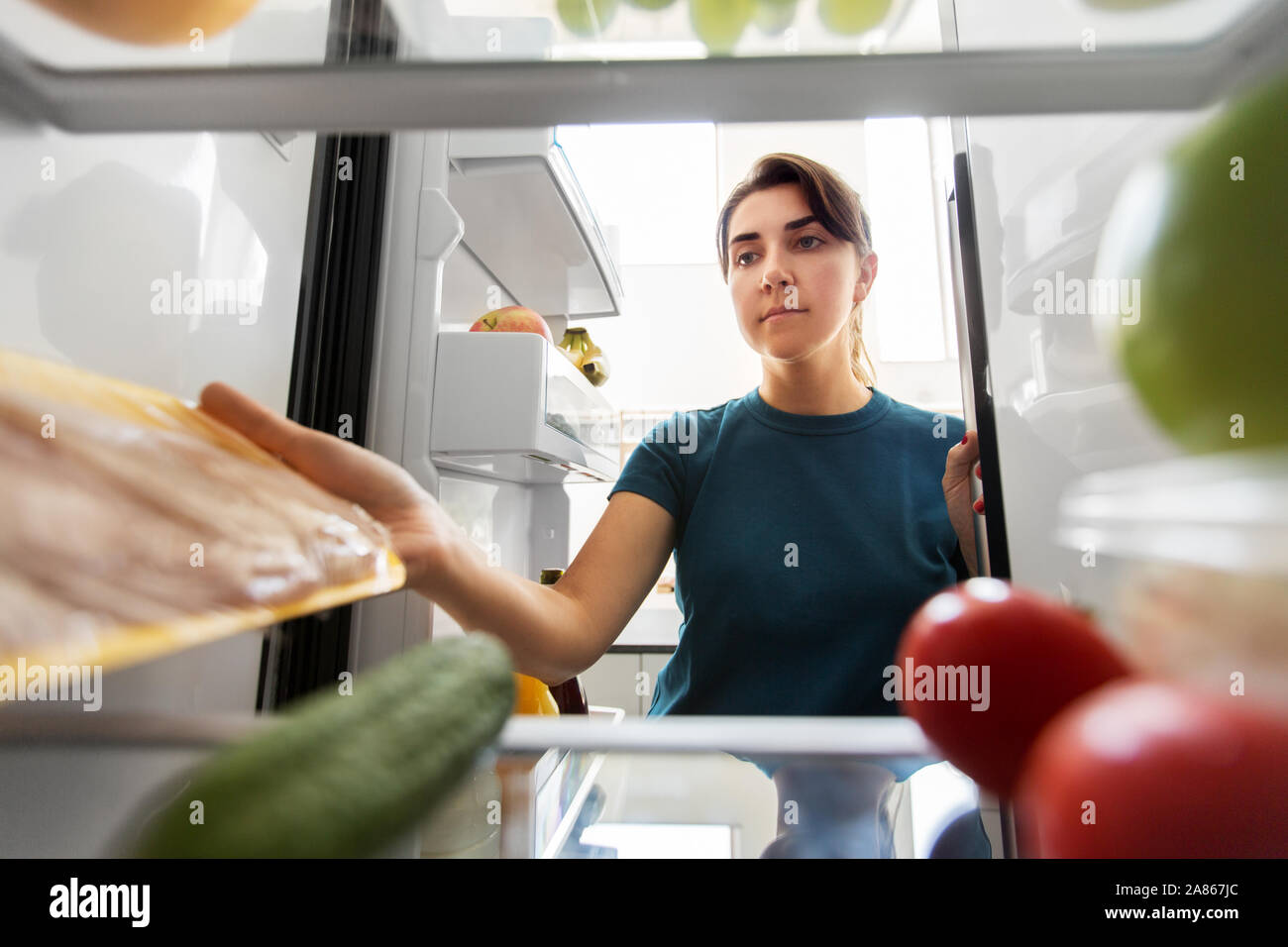 Woman fridge open from inside hi-res stock photography and images - Alamy