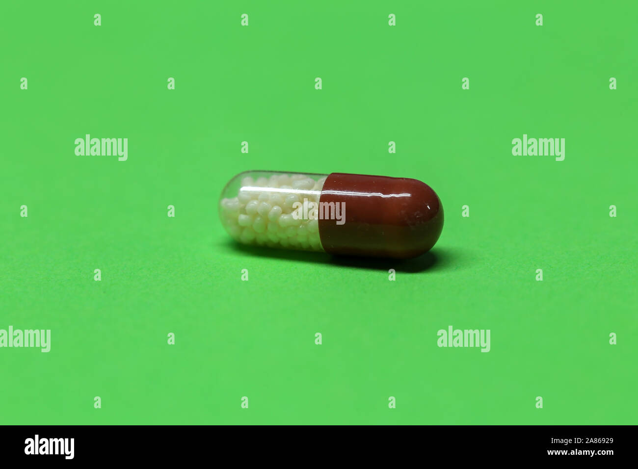 Hard-shelled capsules, which contain dry, powdered ingredients or ...