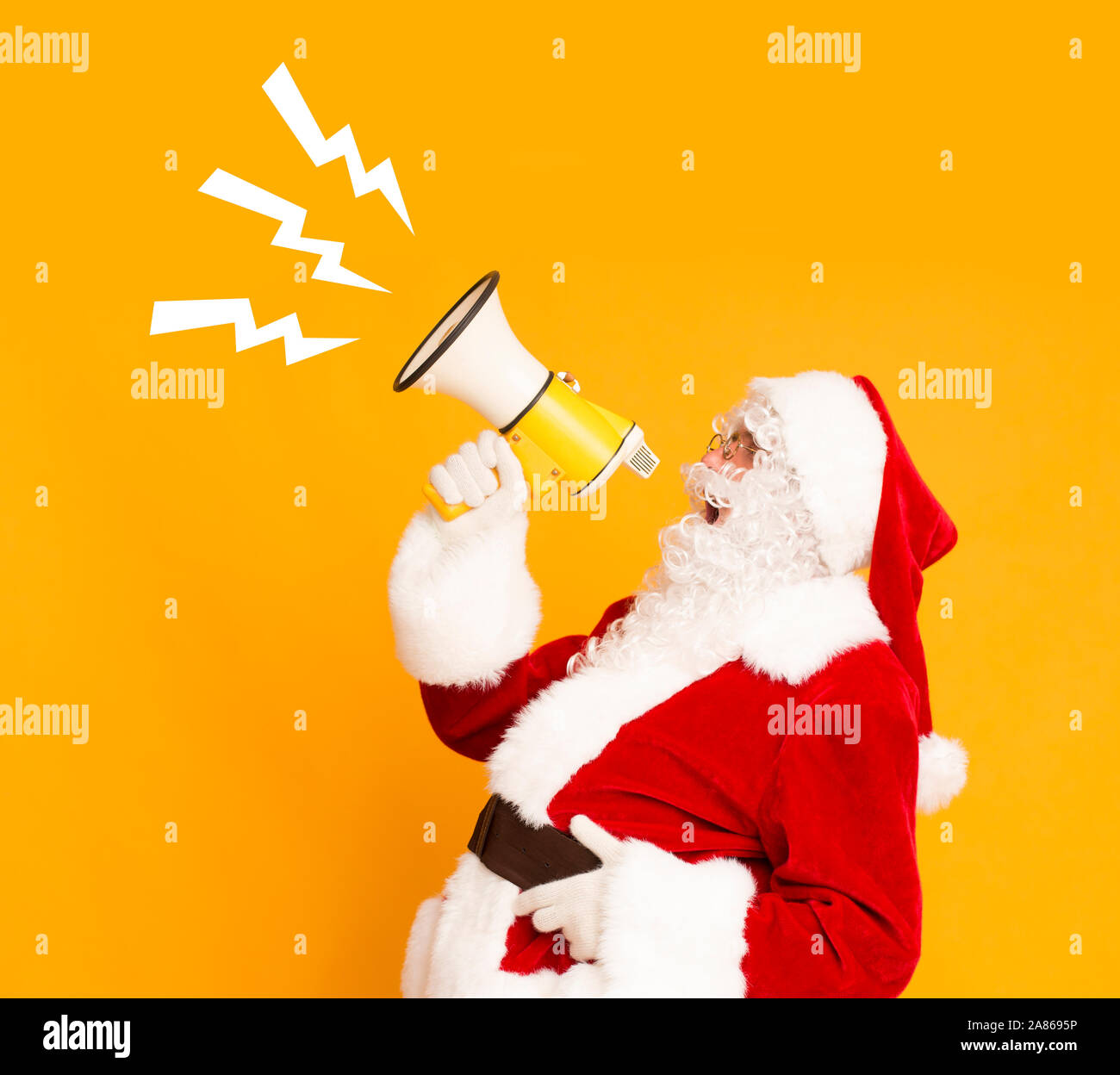 Santa Claus with speaker and sound signs on orange Stock Photo - Alamy