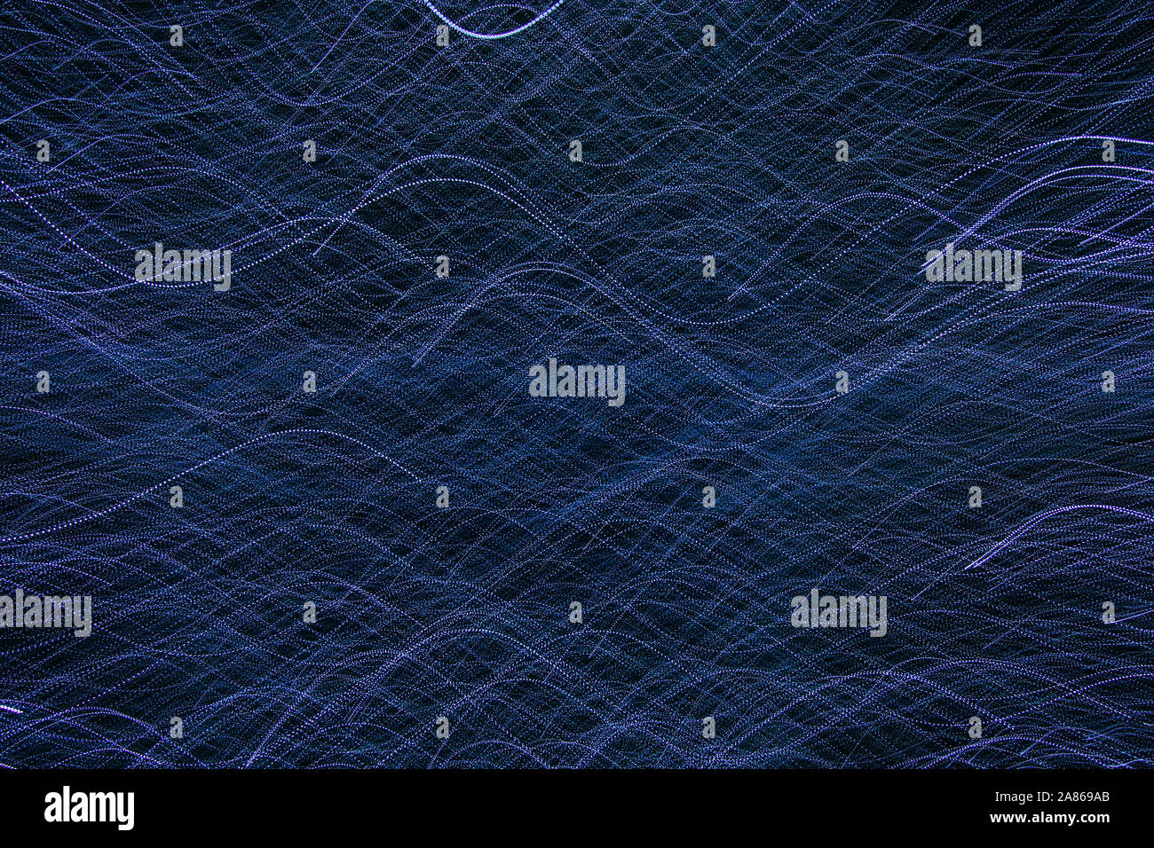 The abstract pattern made by the blue LED lights while moving with the ...