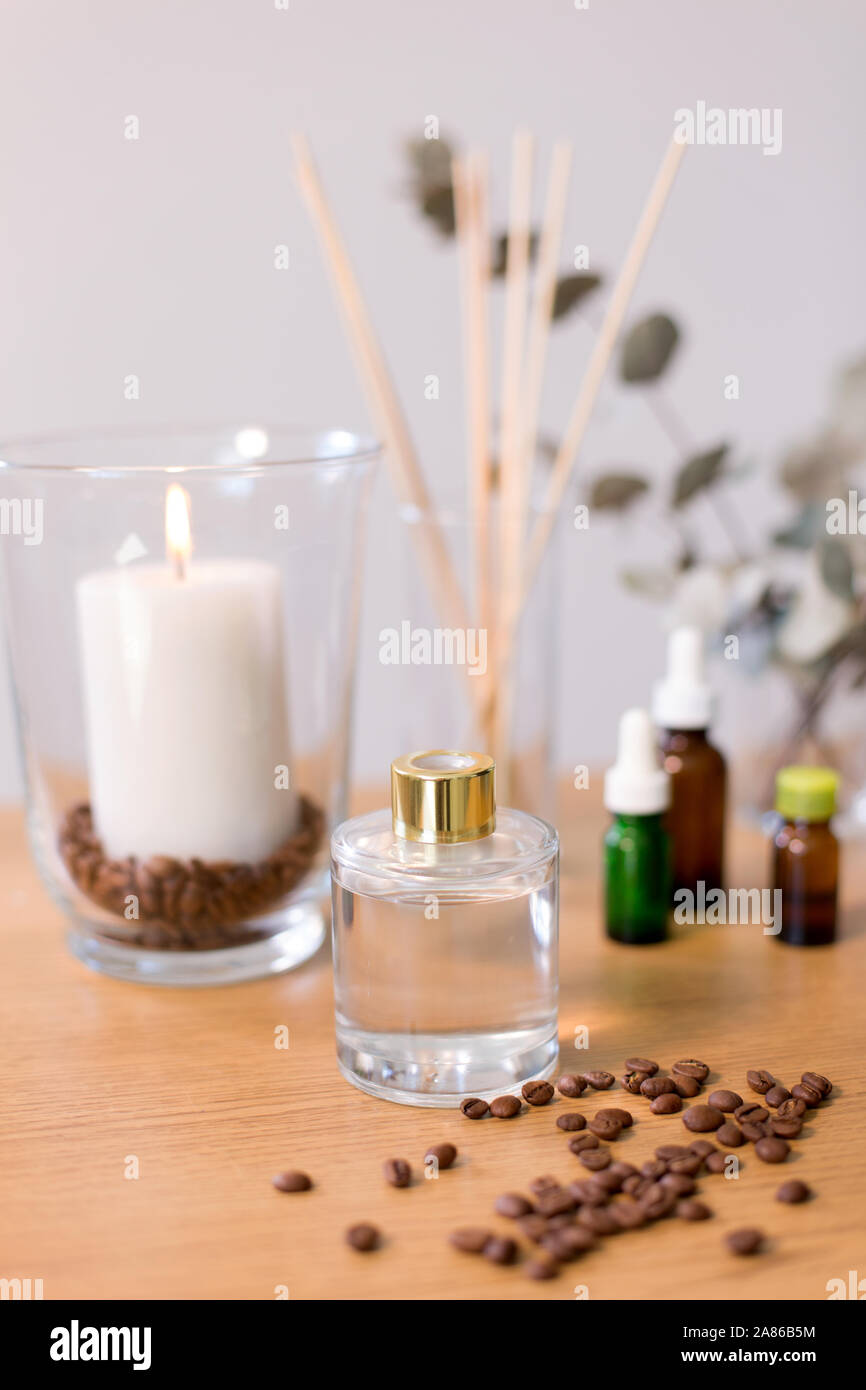 aroma reed diffuser, candle and essential oil Stock Photo - Alamy