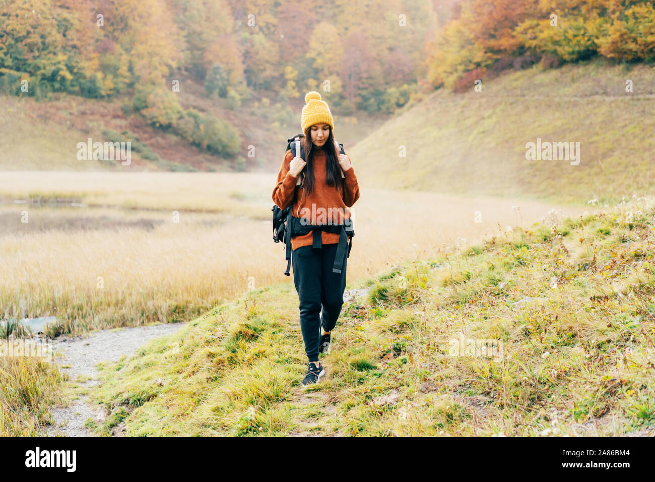 Woman hiker hiking backpacker traveler hi-res stock photography and ...