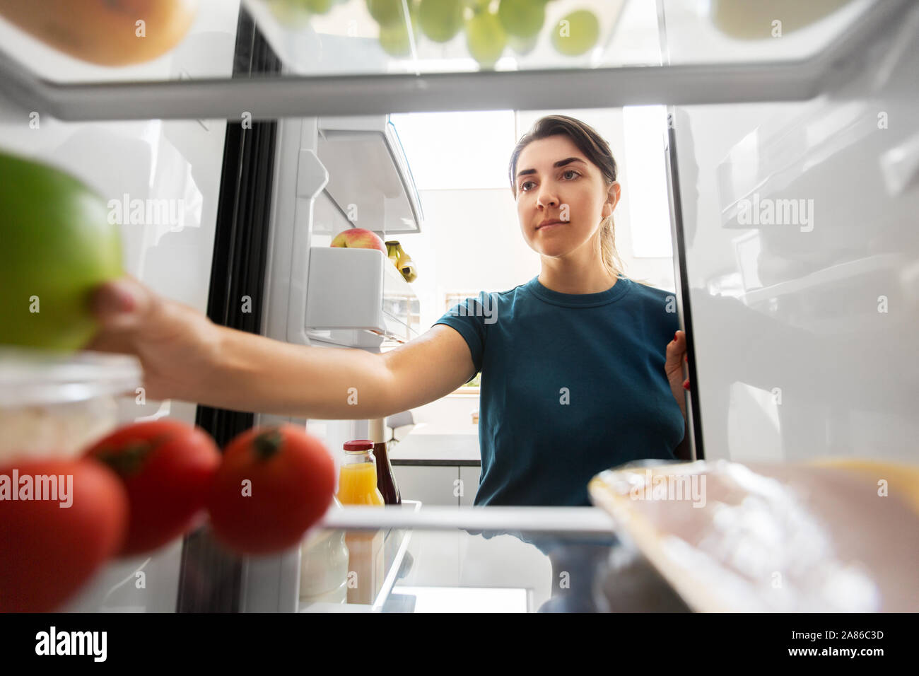 Woman fridge open from inside hi-res stock photography and images - Alamy