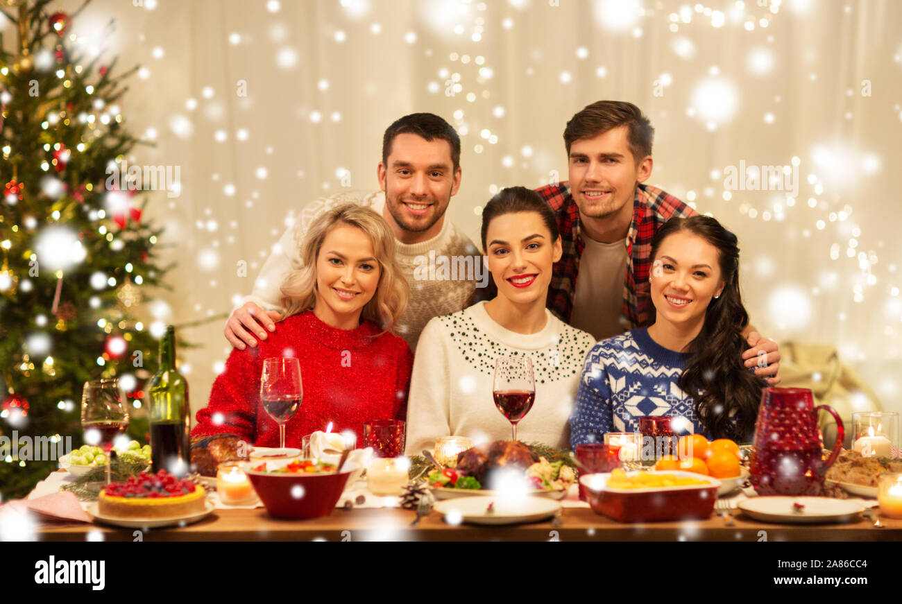 Celebrating christmas happy friends hi-res stock photography and images ...