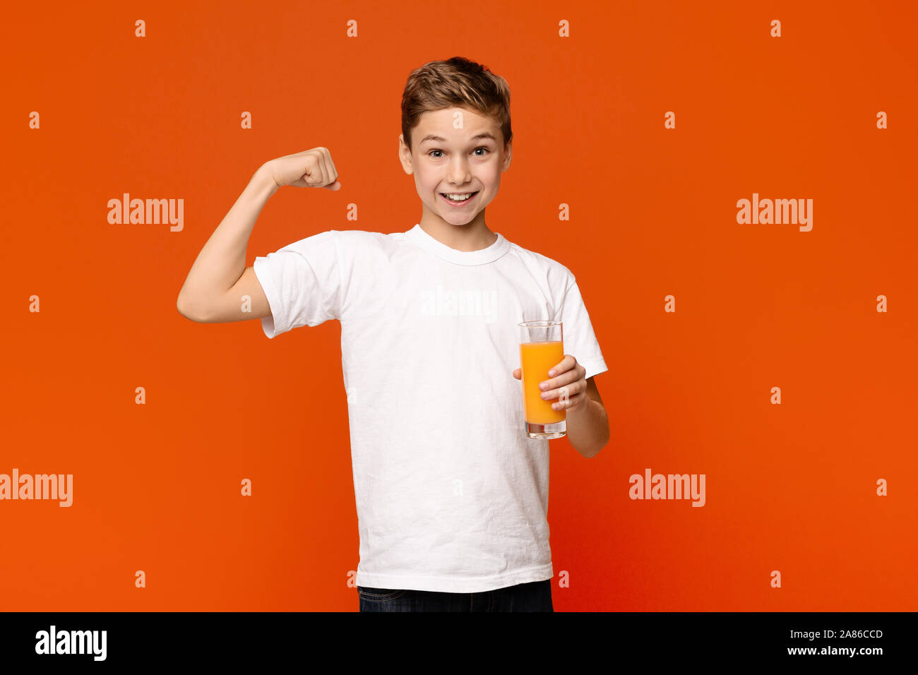 Little boy showing biceps hi-res stock photography and images - Alamy