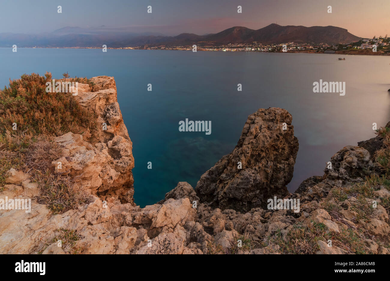Panoramic view on the beach in Crete in the evening. Long exposure ...