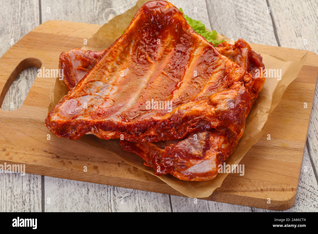 Raw marinated pork ribs ready for cooking Stock Photo - Alamy