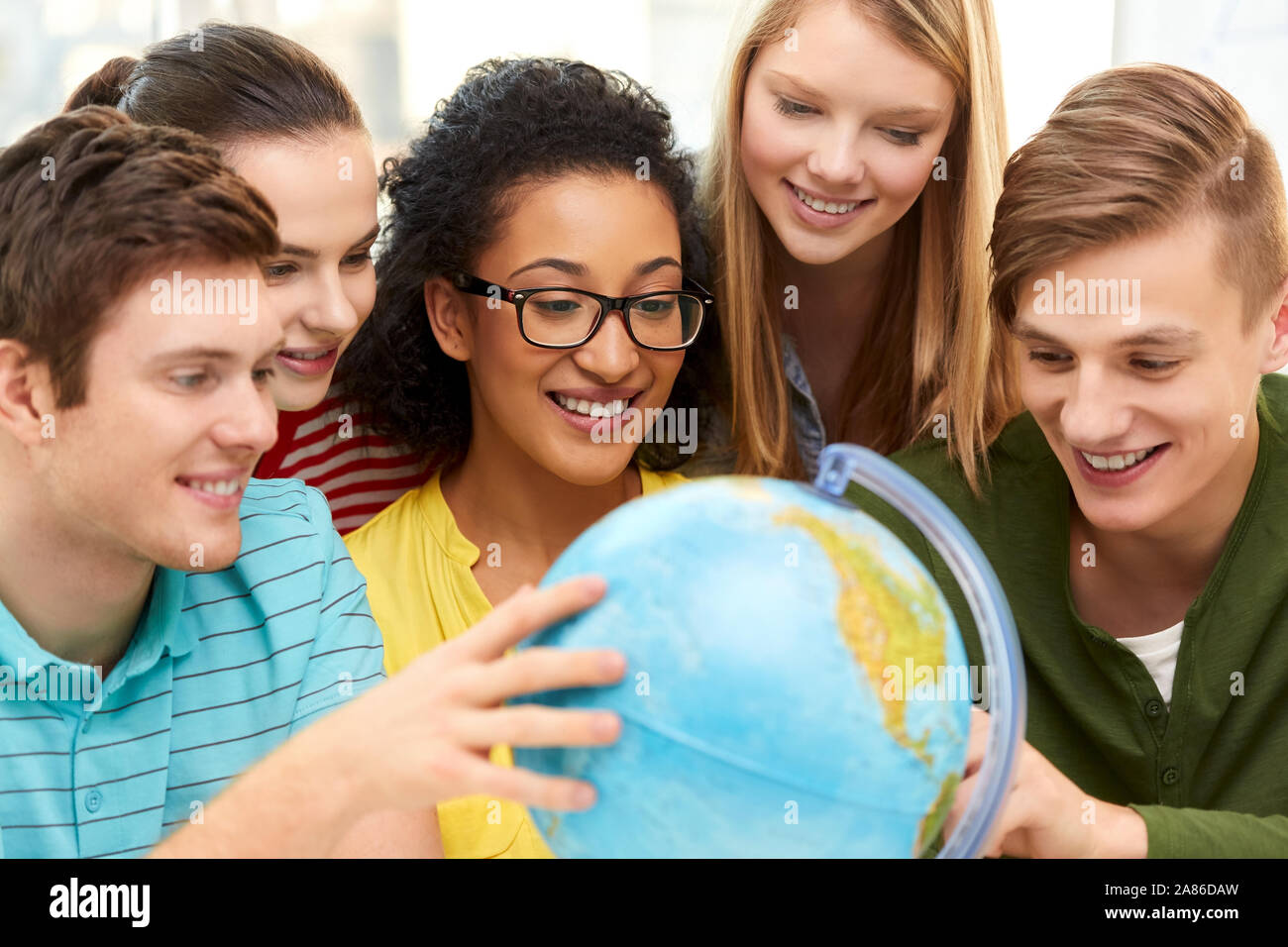 Person looking at world globe hi-res stock photography and images - Alamy