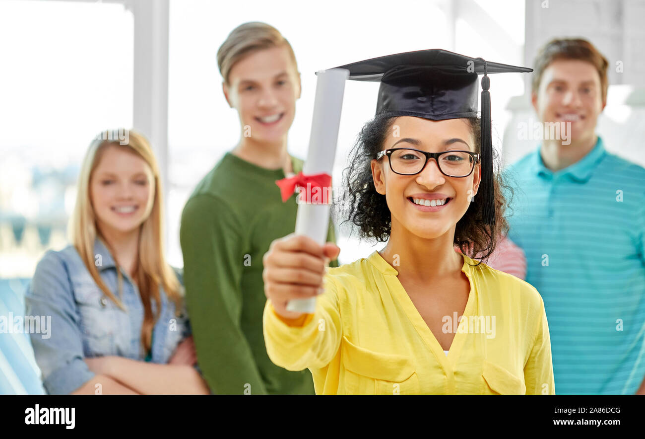 graduate student girl in mortar board with diploma Stock Photo - Alamy