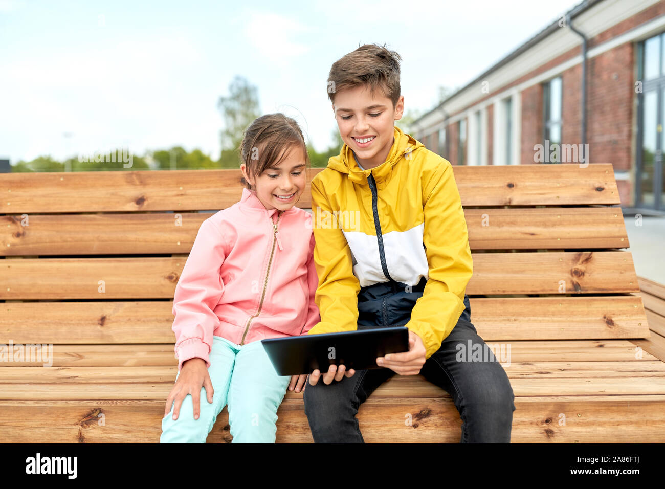 Boy children tablet outdoors hi-res stock photography and images - Alamy