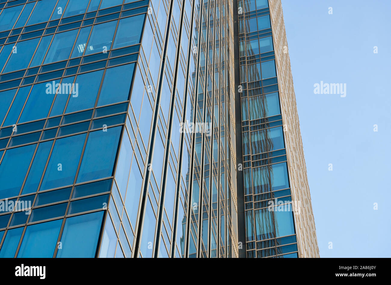 Reflection of the sky in the windows of a building. Perspective and ...