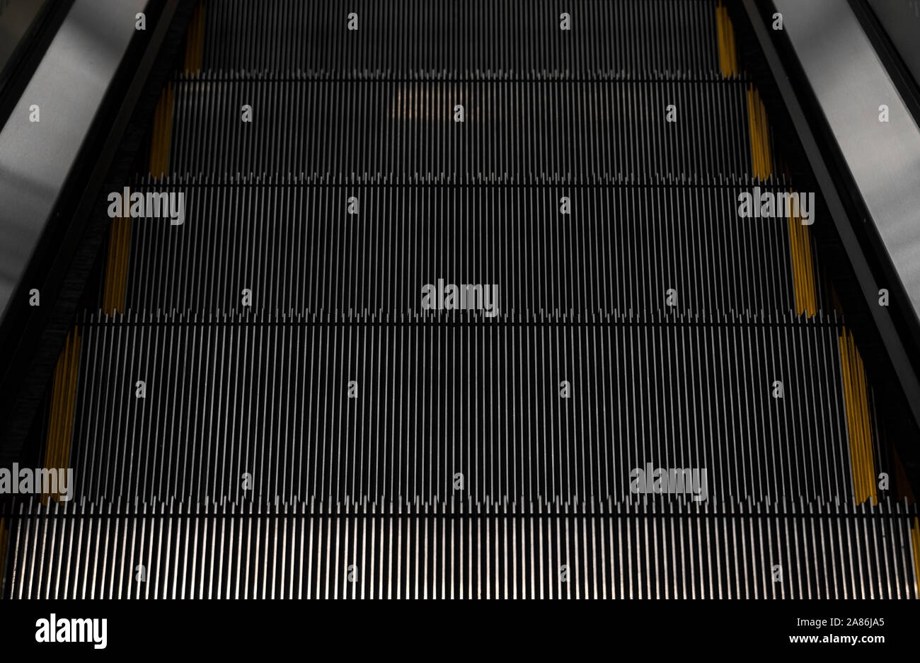 Modern escalator electronic system moving. Escalator is moving up.The ...