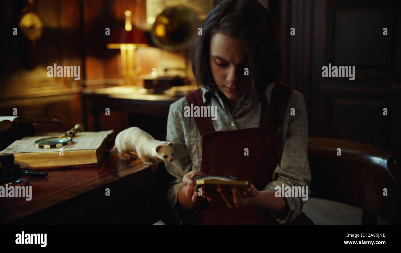 London.UK. Dafne Keen and shape shifting daemon Pantalaimon (voiced by ...