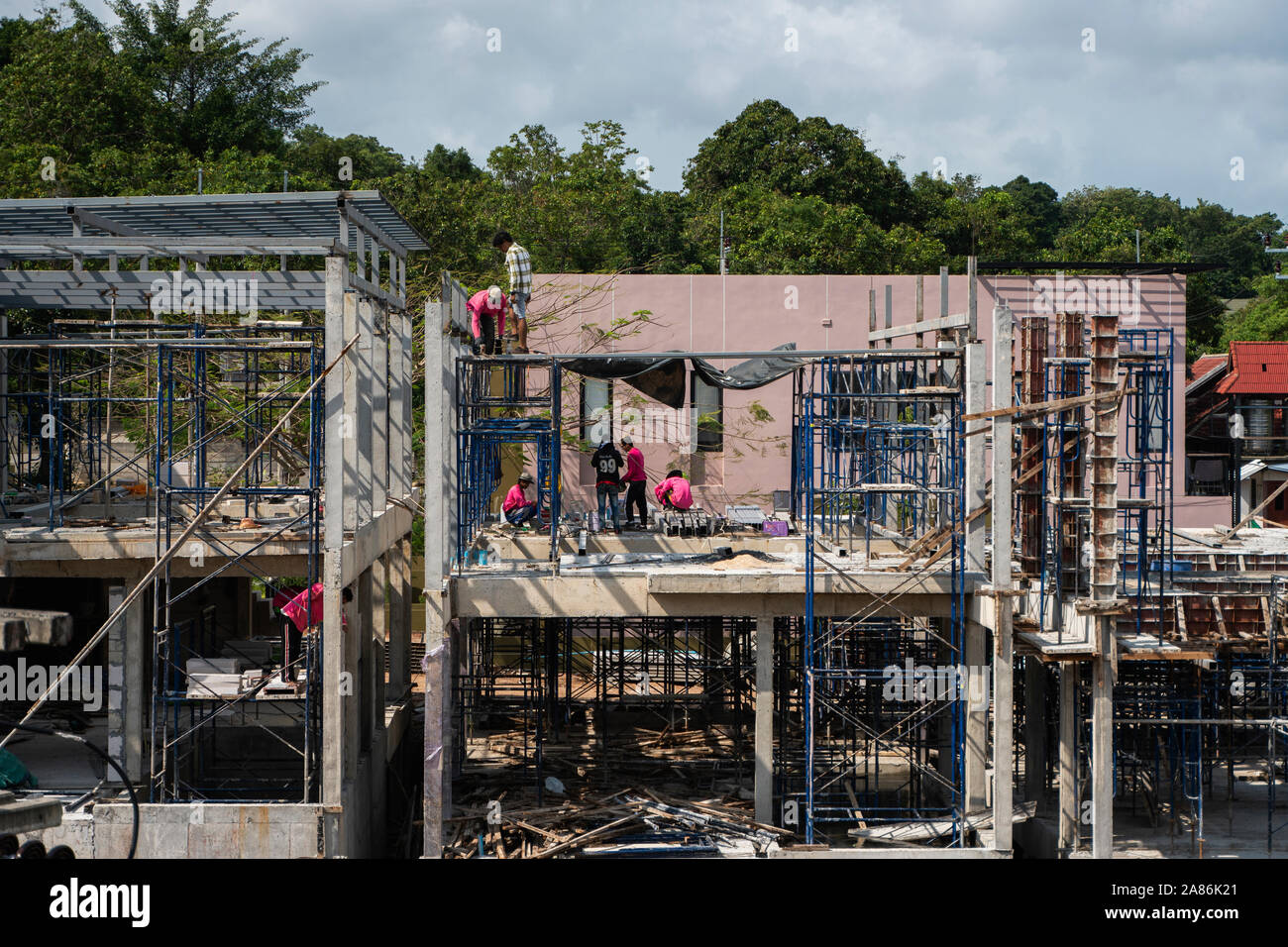 PHUKET, THAILAND - FEBRUARY 10, 2019. Workers work on the new under ...