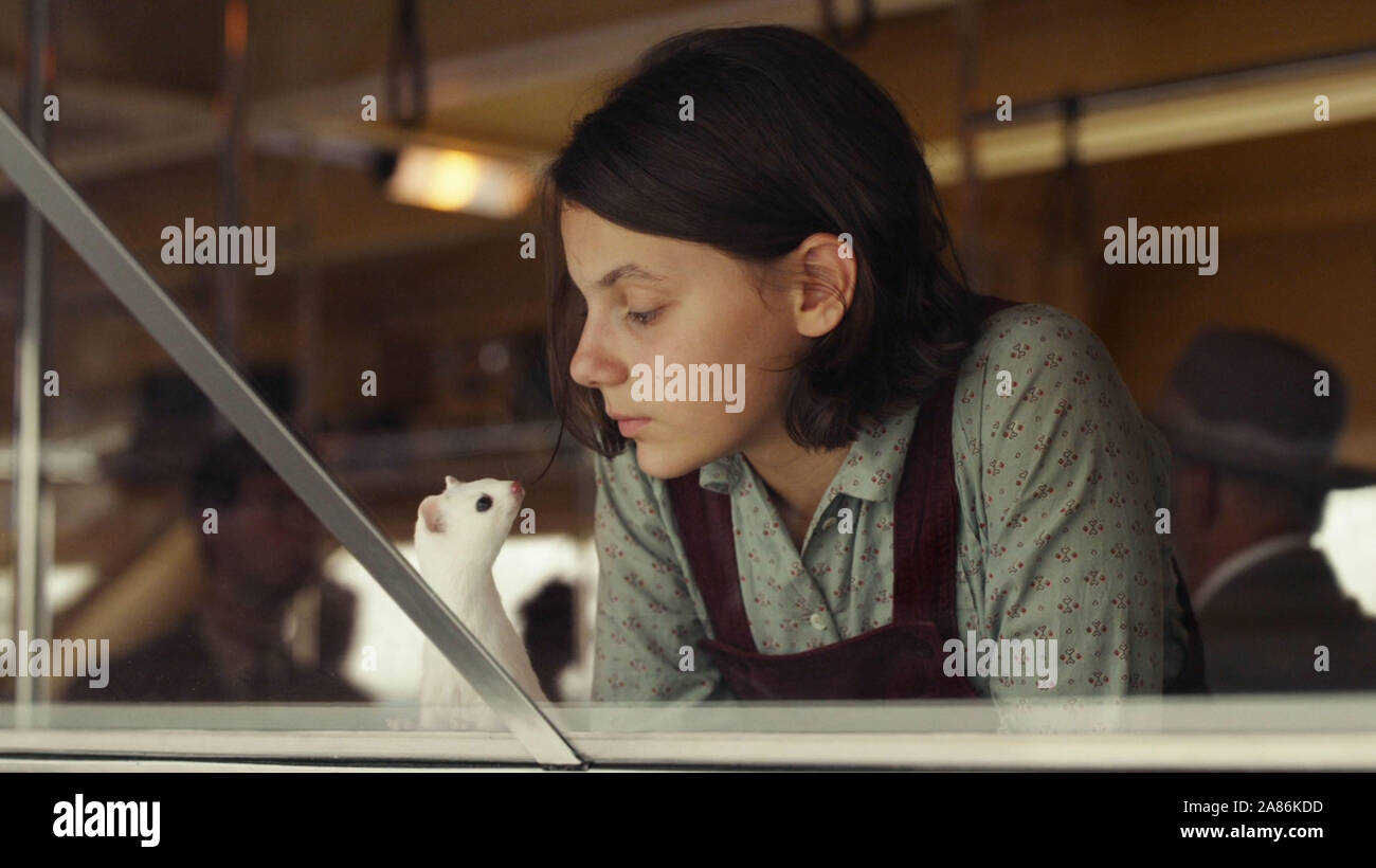 London.UK. Dafne Keen and shape shifting daemon Pantalaimon (voiced by ...