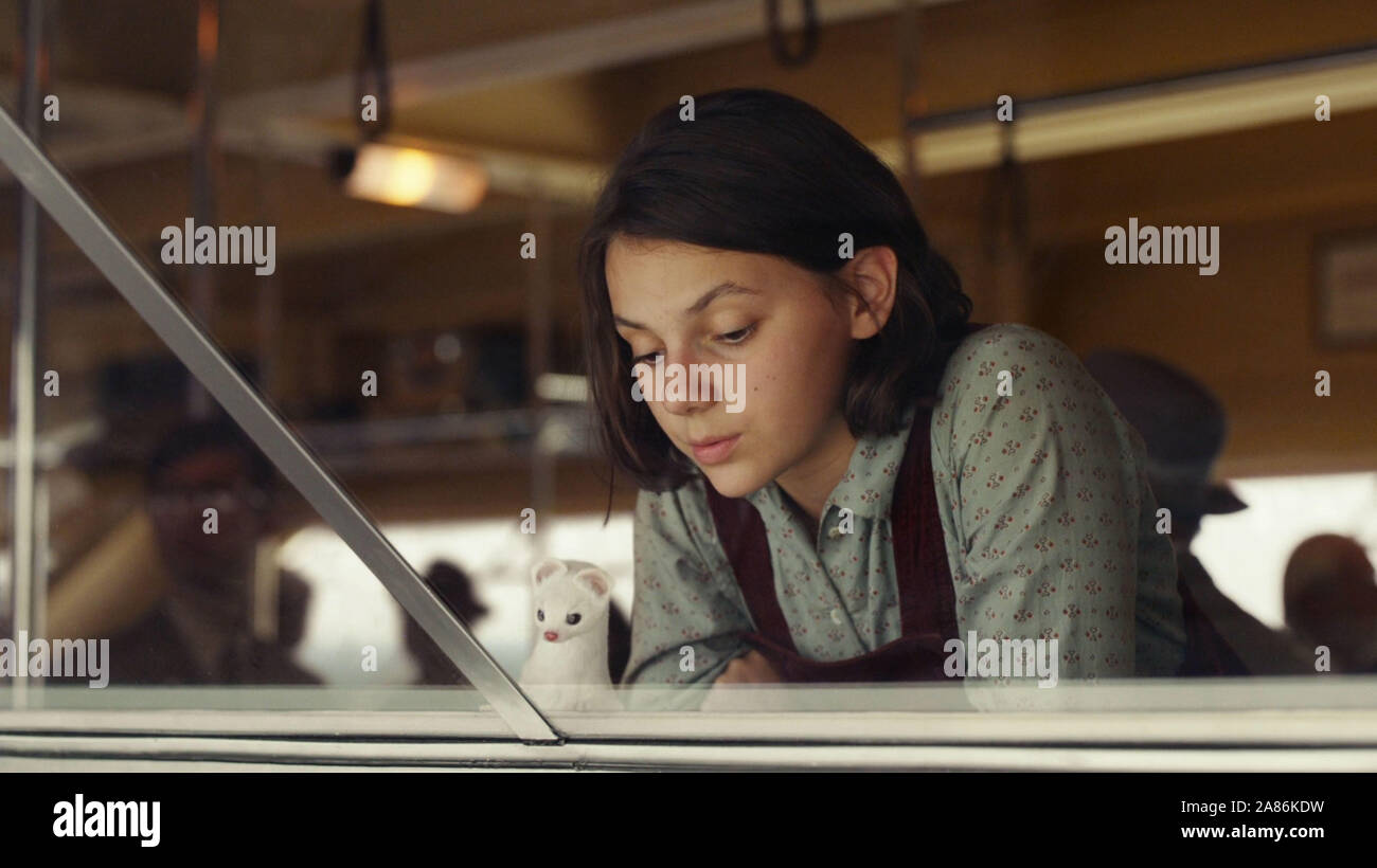 London.UK. Dafne Keen and shape shifting daemon Pantalaimon (voiced by ...