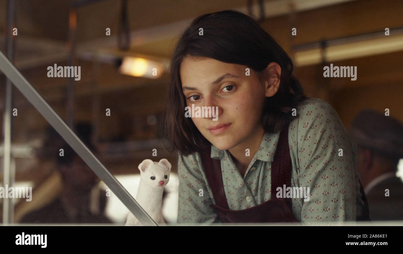 London.UK. Dafne Keen and shape shifting daemon Pantalaimon (voiced by ...