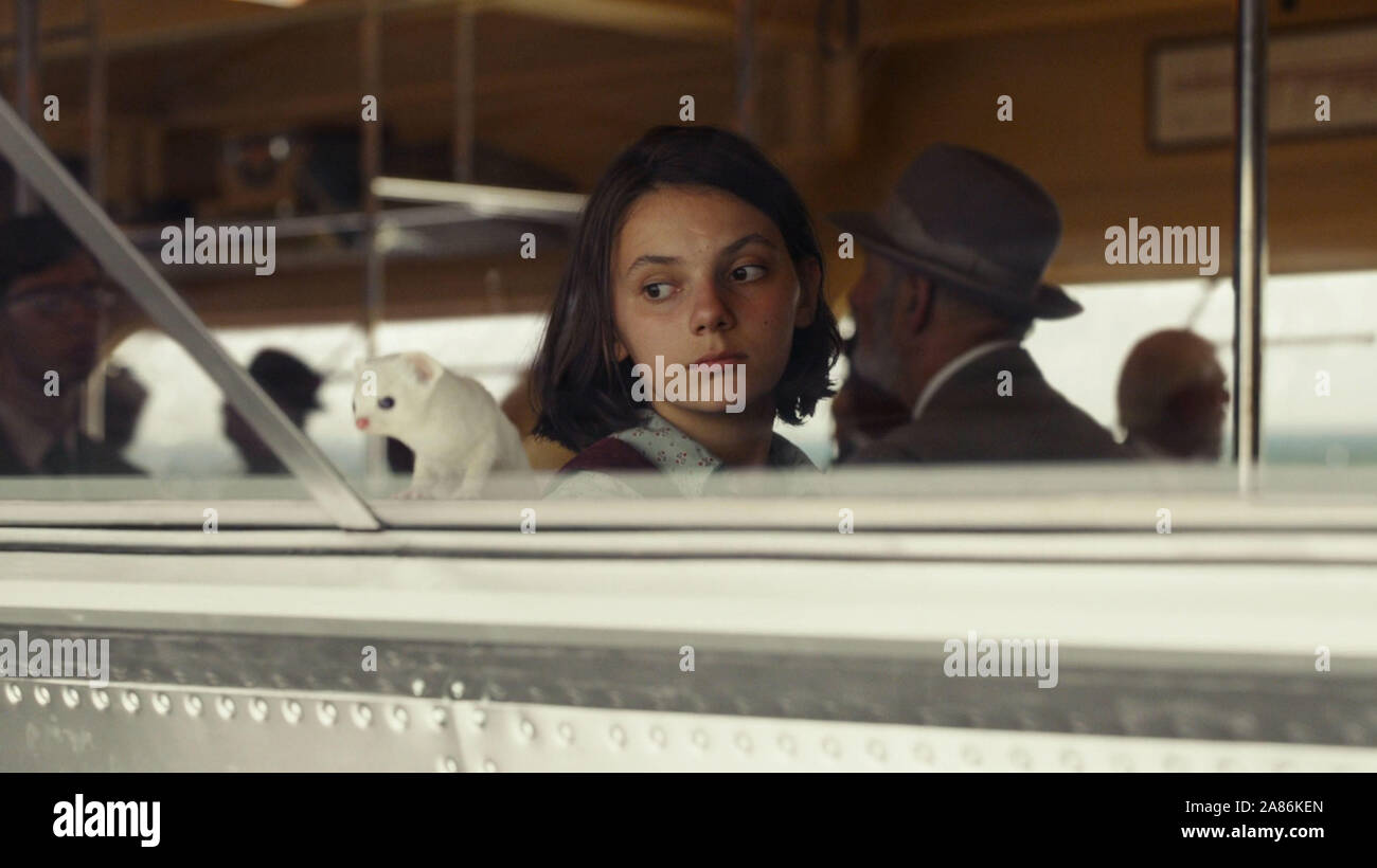 London.UK. Dafne Keen and shape shifting daemon Pantalaimon (voiced by ...