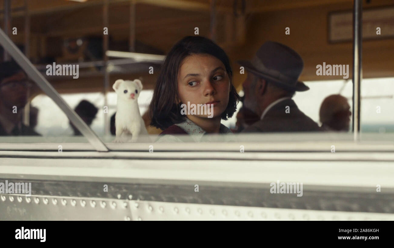 London.UK. Dafne Keen and shape shifting daemon Pantalaimon (voiced by ...