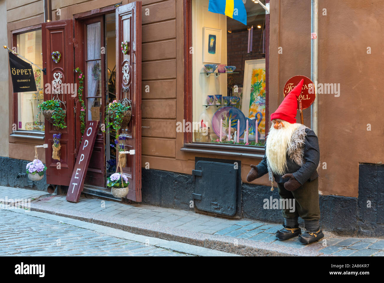 Shops,stores and outdoor restaurants in old town Gamla Stan in ...
