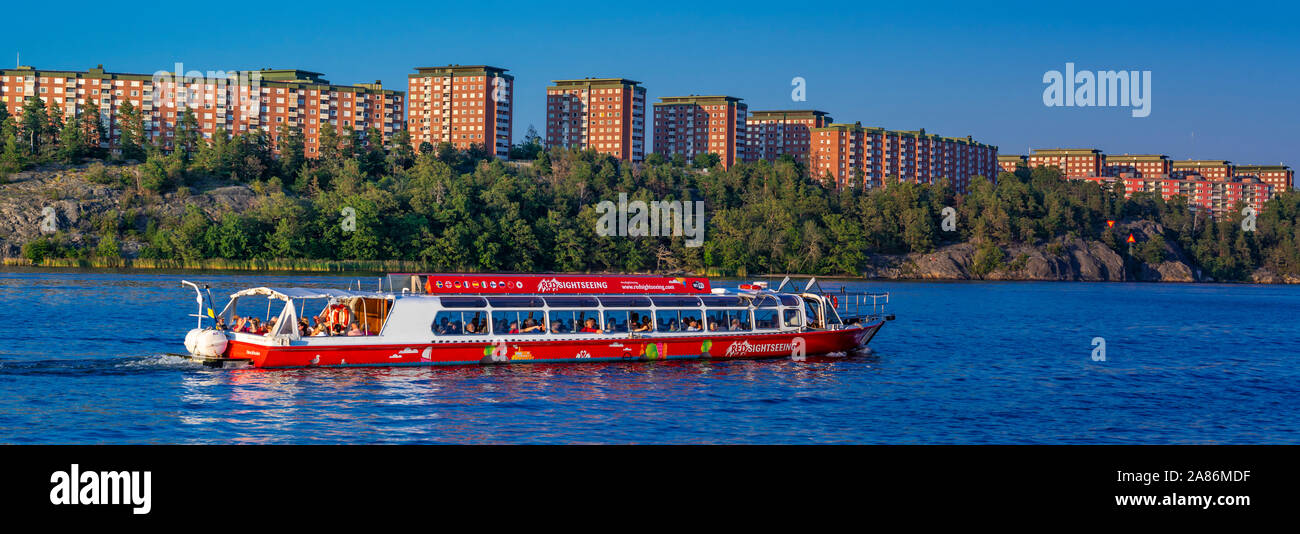 A red tourboat near the Frihamnen Cruiseship port in Stockholm, Sweden ...