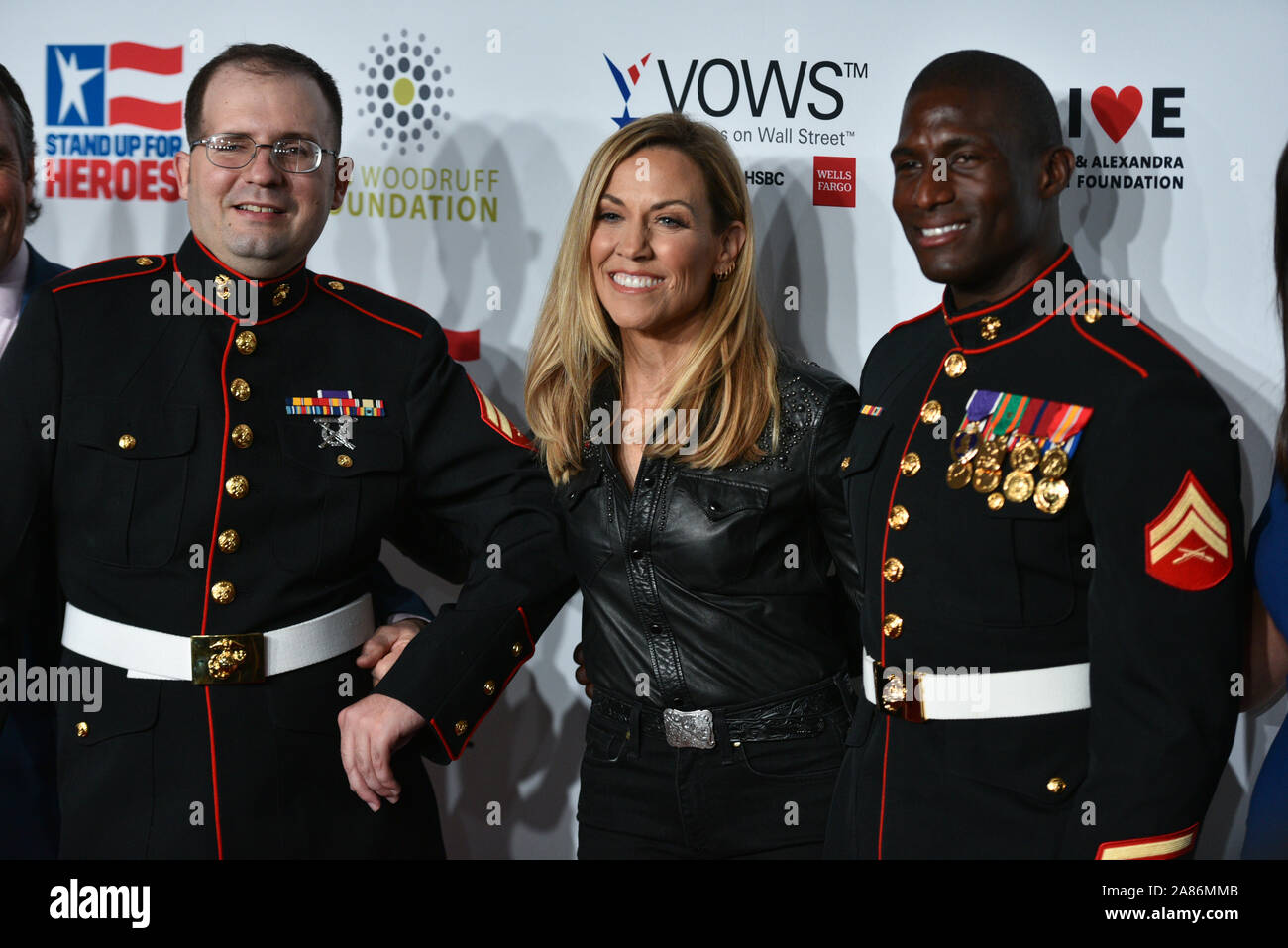Retired Corporal Steven Schulz, Sheryl Crow and Corporal Kionte Storey ...