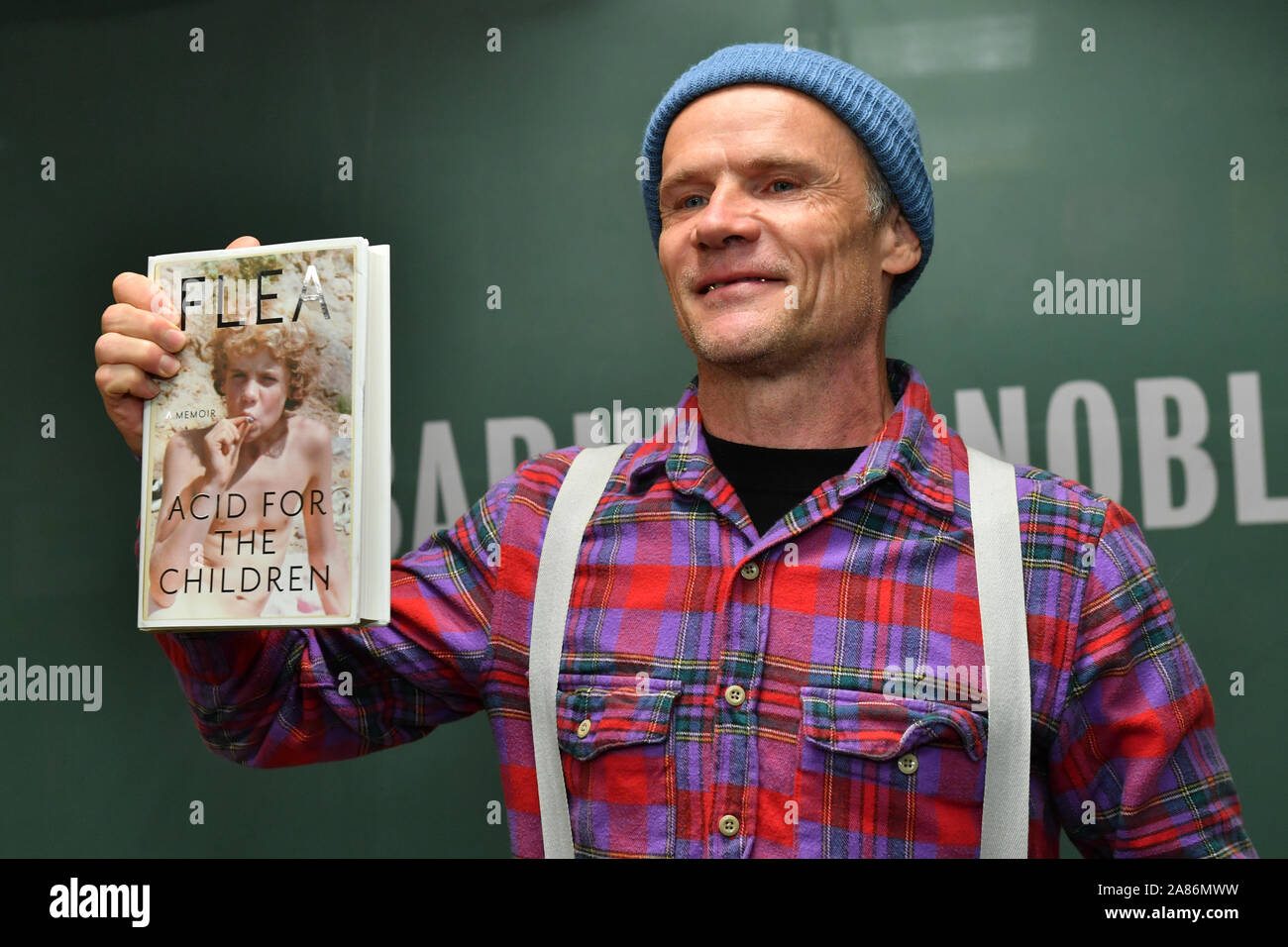 Flea of the Red Hot Chili Peppers signs copies of his new book "Acid ...