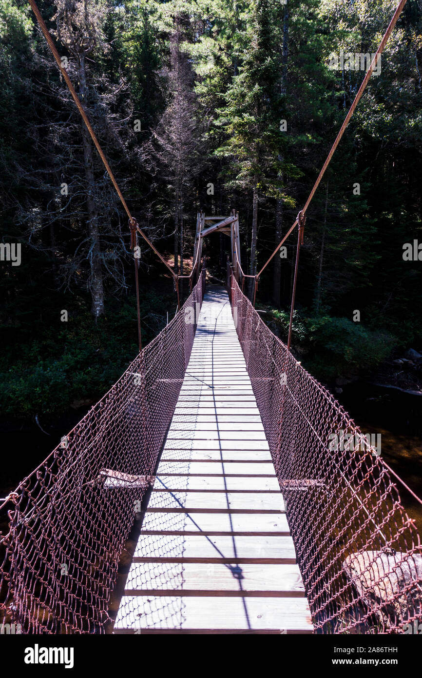 A suspension bridge crossing Upstate New York's Northville Placid Trail ...