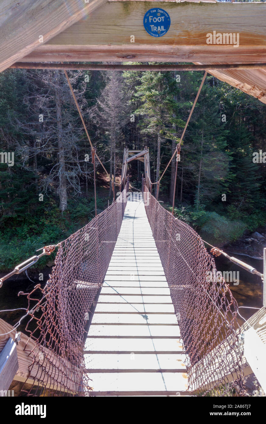 A suspension bridge crossing Upstate New York's Northville Placid Trail ...