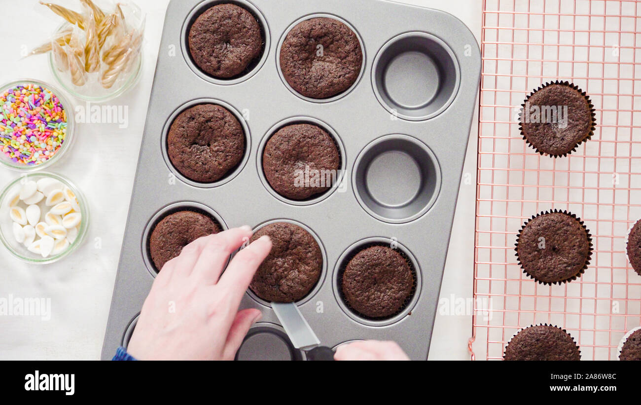 Flat lay. Step by step. Cooling freshly baked chocolate cupcakes on a ...
