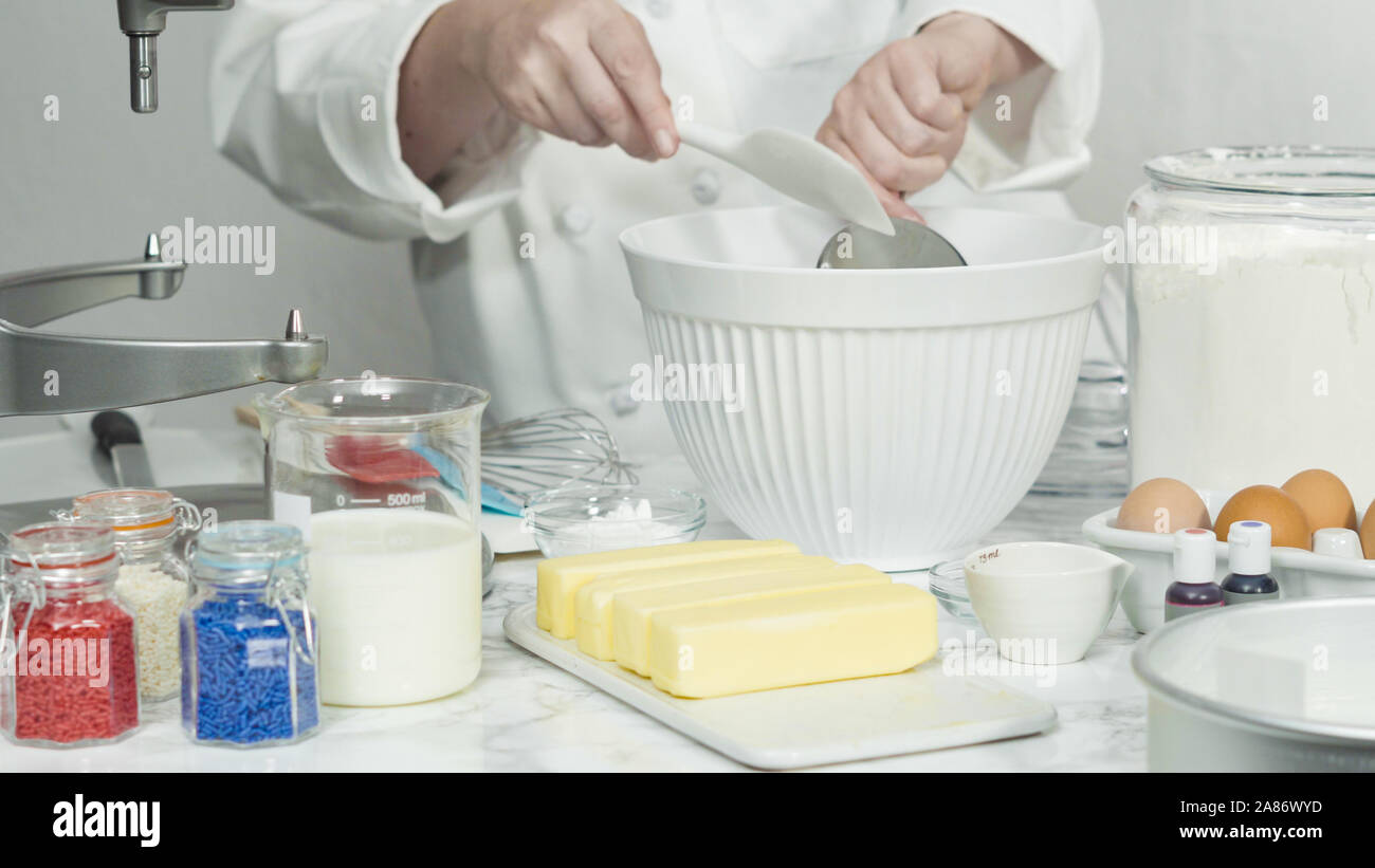 Step by step. Mixing ingredients in standing kitchen mixer to bake a ...