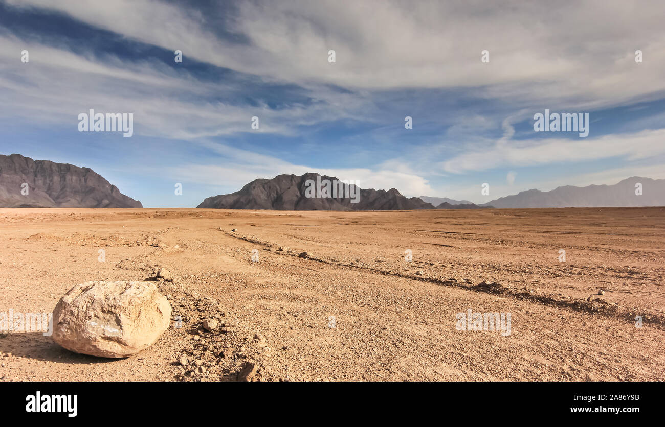 Desert with mountains. Panorama of a desert in Afghanistan with ...