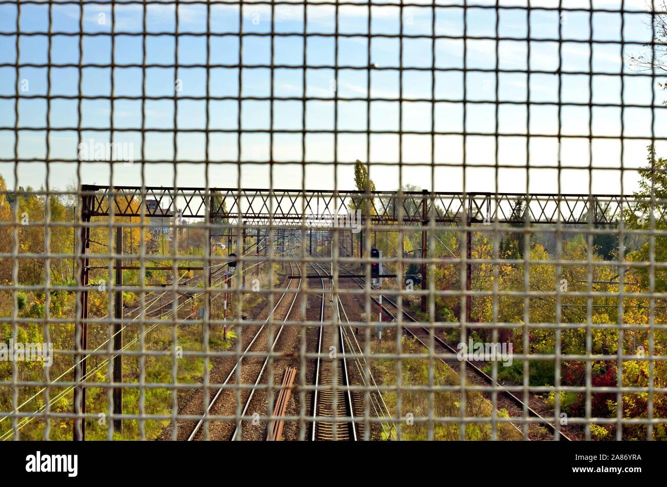Railways fence, Looking at a railways train link to fence Stock Photo ...