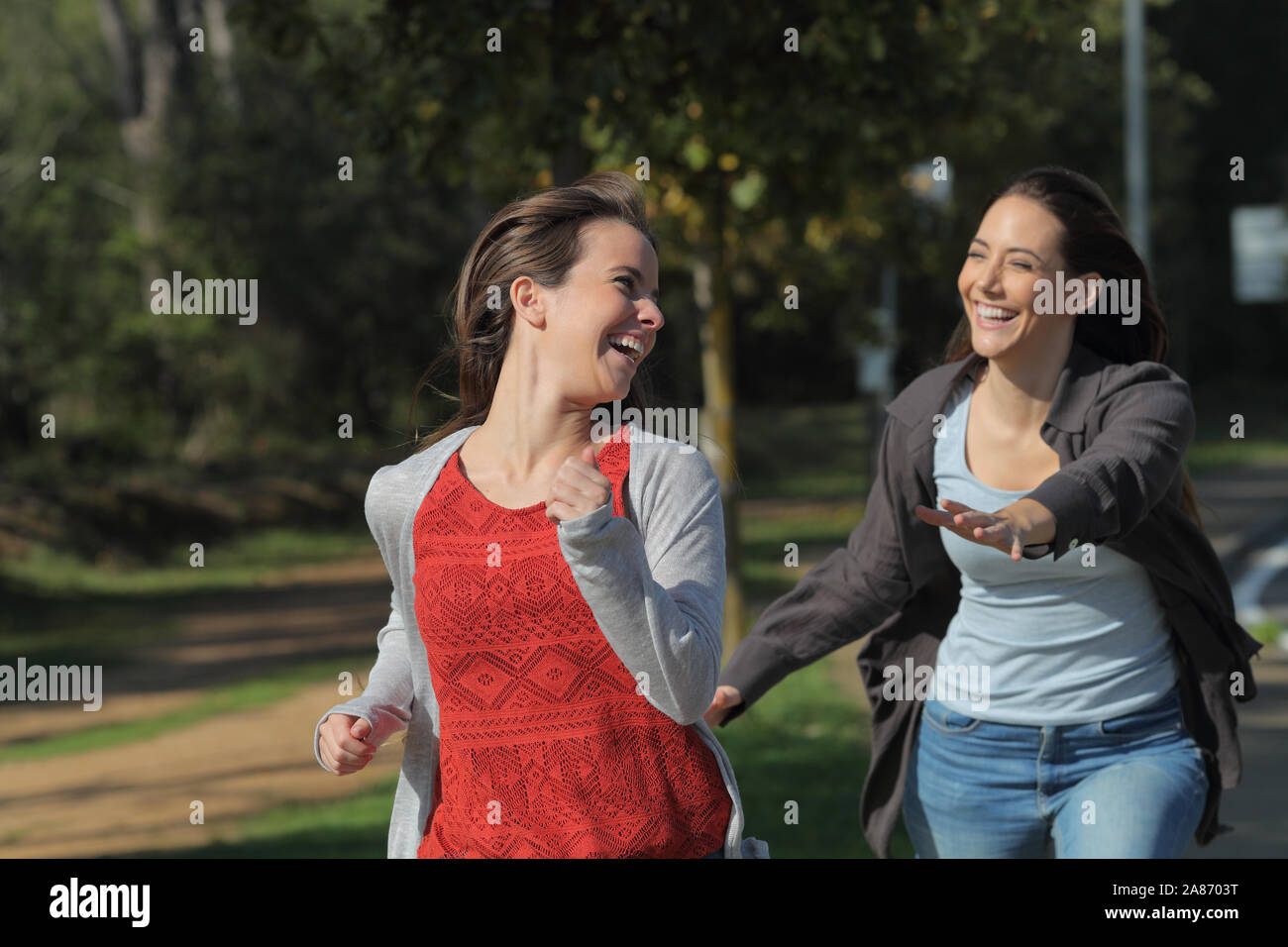 Laughing joking together teenagers hi-res stock photography and images ...