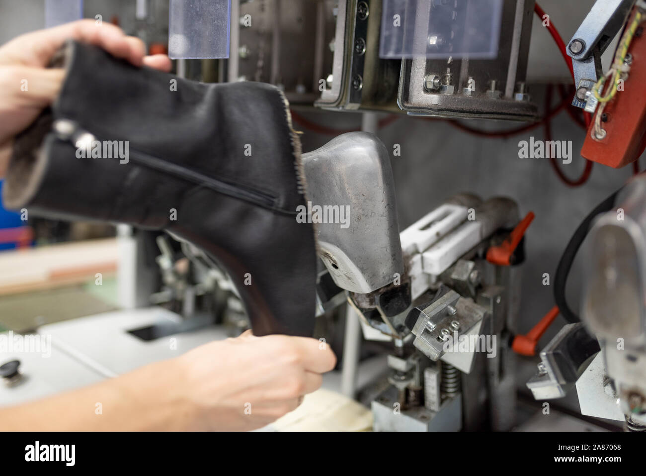Machine for forming boot hi-res stock photography and images - Alamy